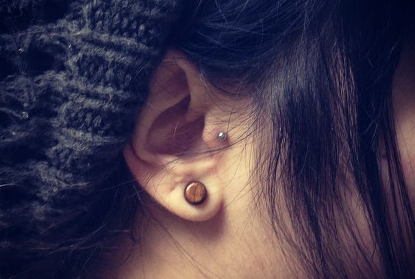 Does A Tragus Piercing Hurt? Plus, Everything Else You Need To Know ...
