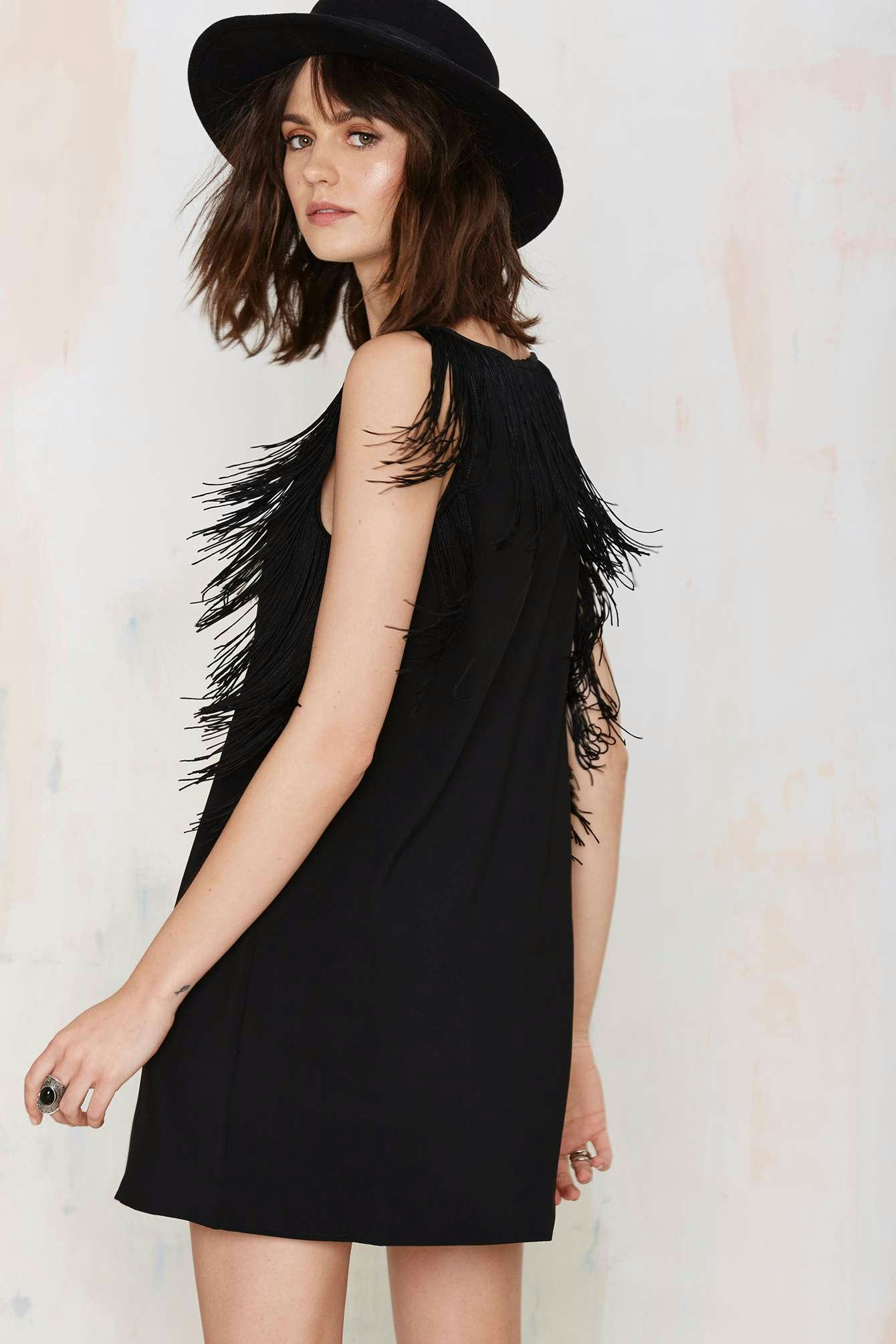 How To Pull Off Fringe Without Looking Too Much Like A Cowboy