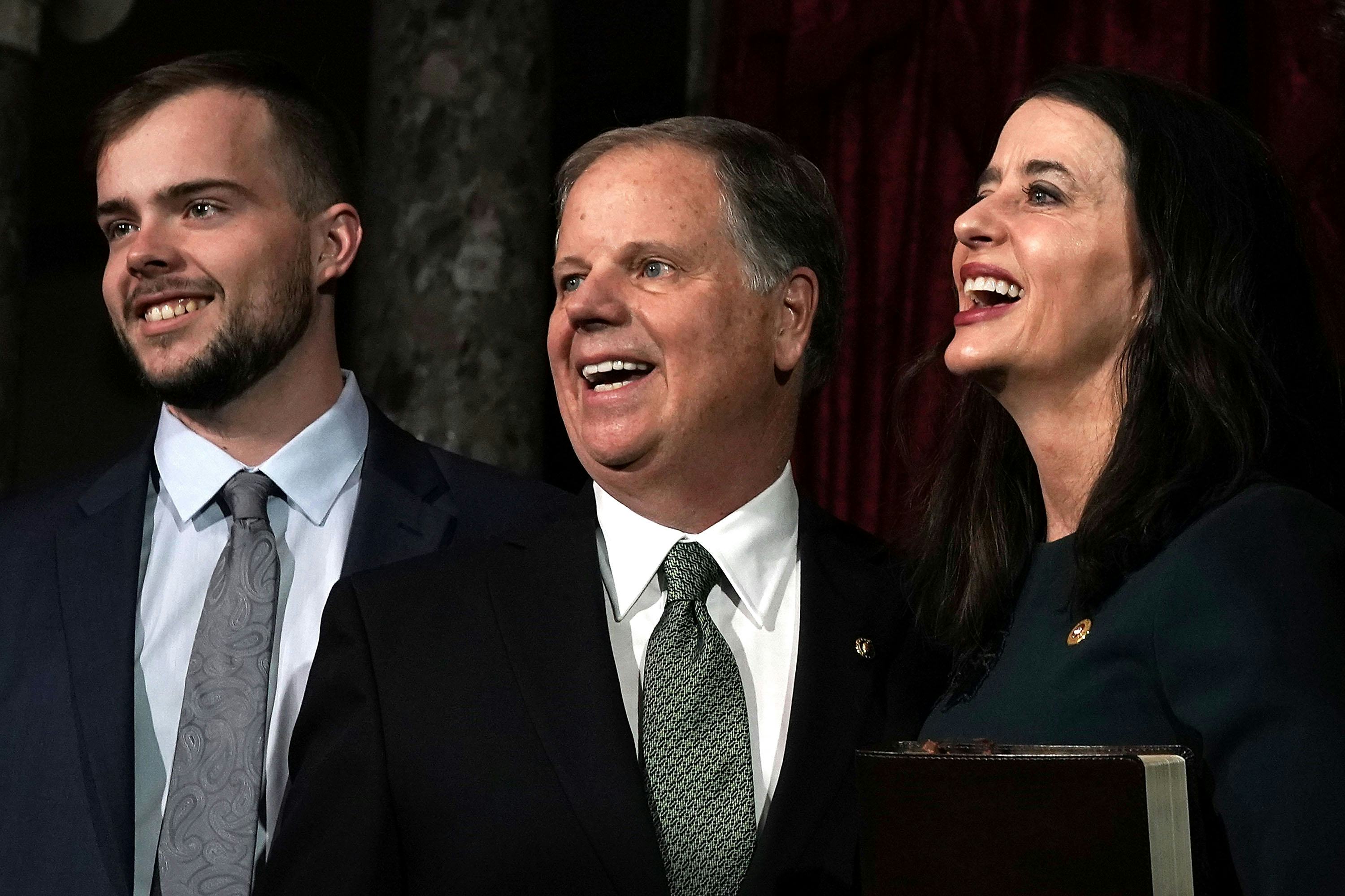 This Photo Of Doug Jones' Son & Mike Pence Is Already The Pic Of the Year