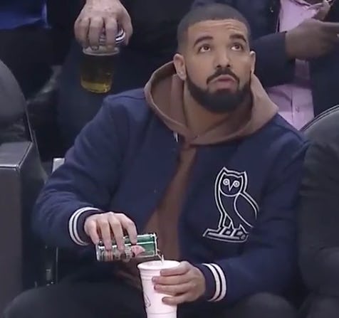 These Memes About Drake Pouring A Drink At The Raptors Game Are Hilarious